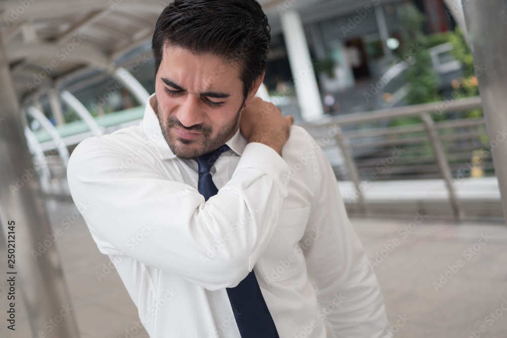Sick unhealthy asian man suffering from shoulder pain, stiff shoulder ...