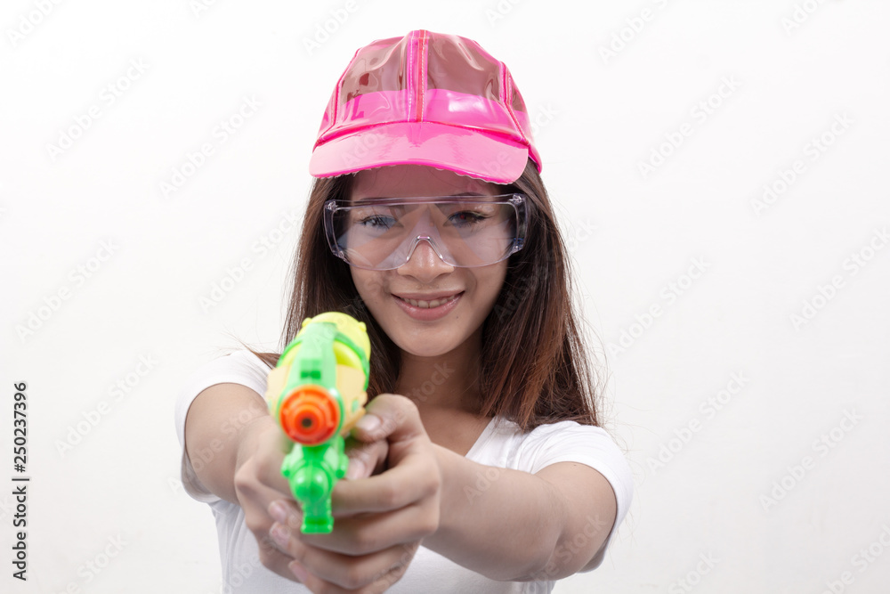 Young Happy Beauty Asian Woman Holding Plastic Water Gun In Hand At