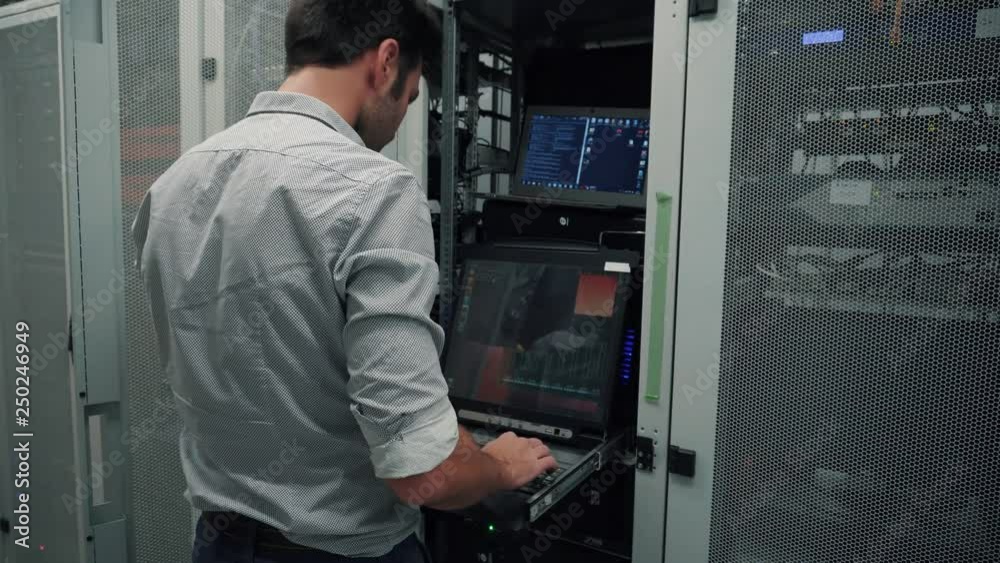 Server IT Engineer In Data Center Server Room.Network Engineer Working ...