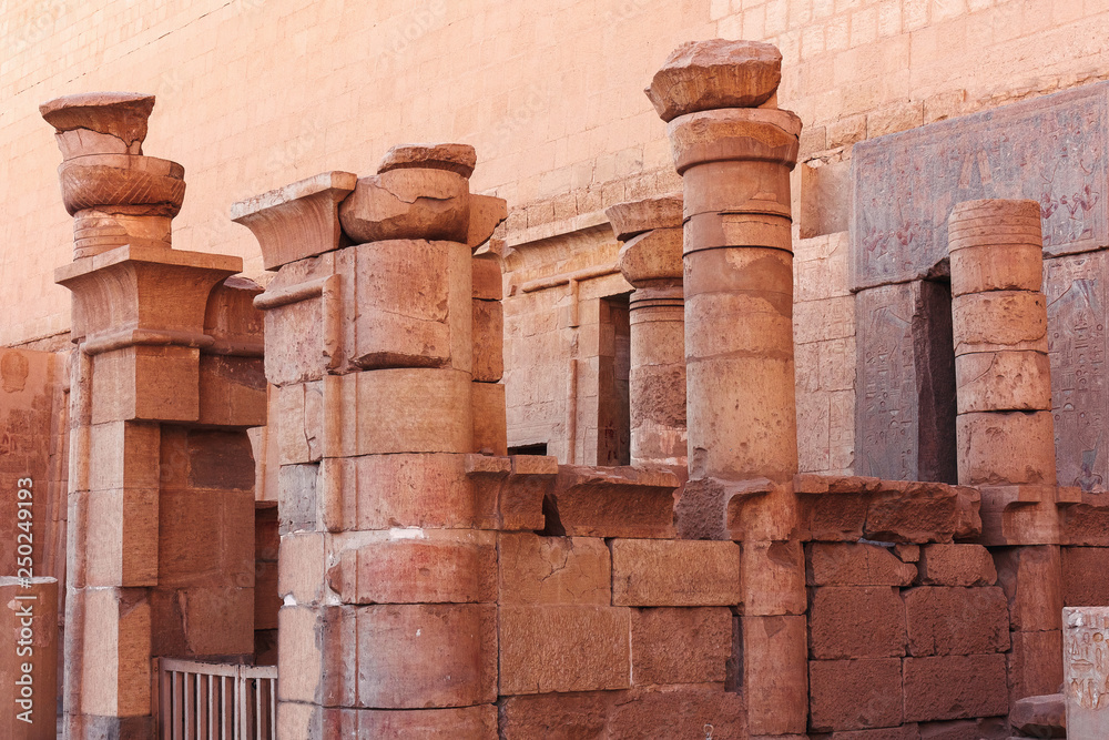 Antique architecture with stone columns in in Ancient Egyptian temple ...