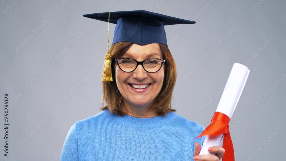 graduation, education and old people concept - happy senior graduate ...