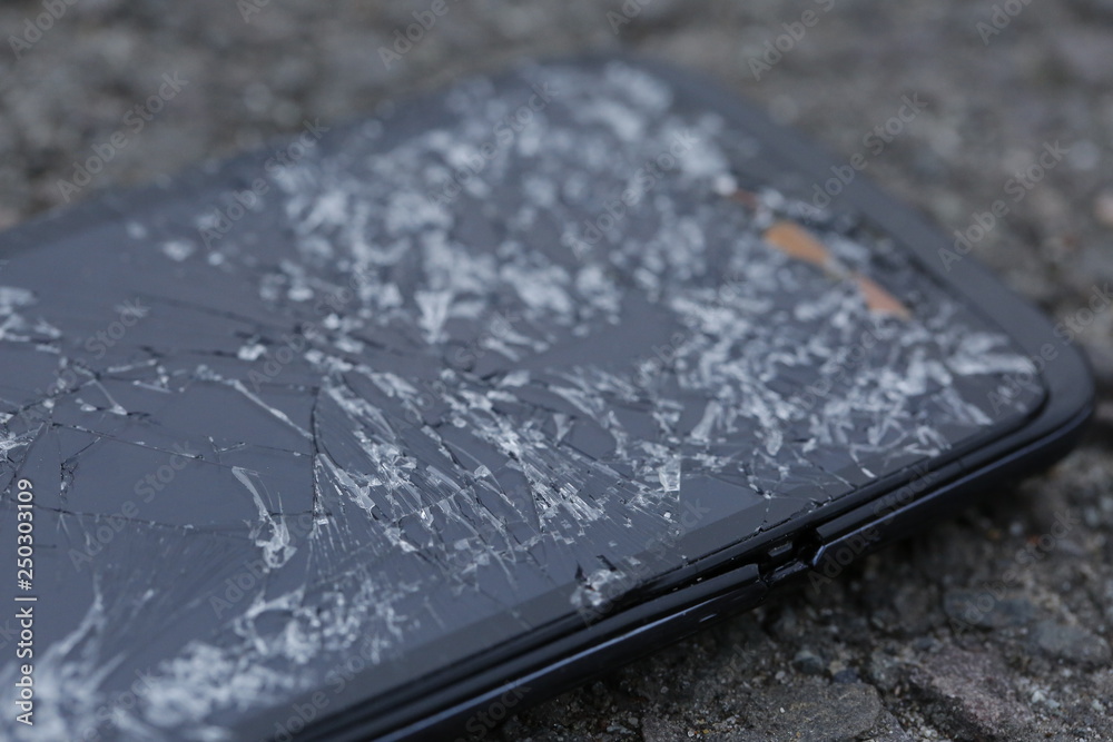 Broken, destroyed, ruined modern mobile smartphone, cell phone, mobile ...