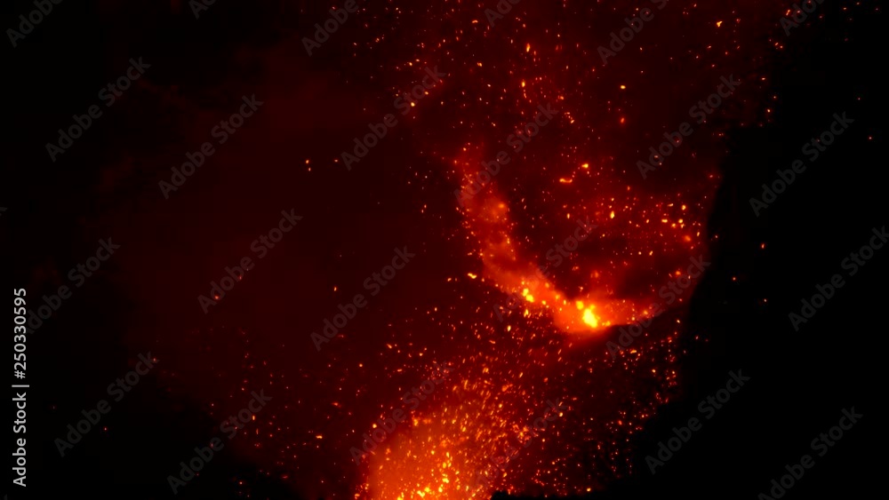 CLOSE UP: Bright orange lava and raging flames erupt out of the active ...