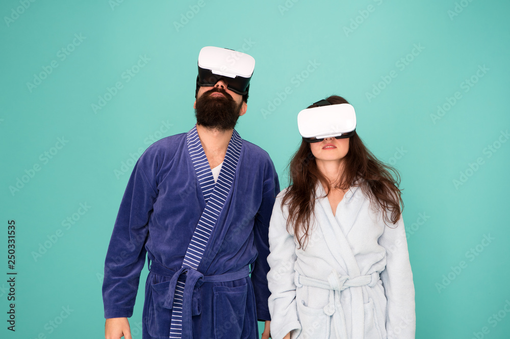 Bearded man and woman in robe. Couple in love. Family. Virtual reality ...