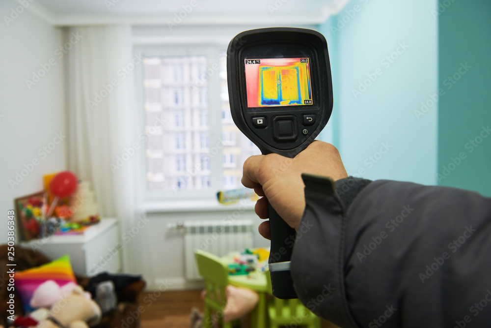 thermal imaging camera inspection of building. check temperature Stock ...