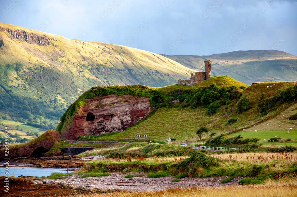 Ruins of medieval Red Bay Castle at western coast of County Antrim ...