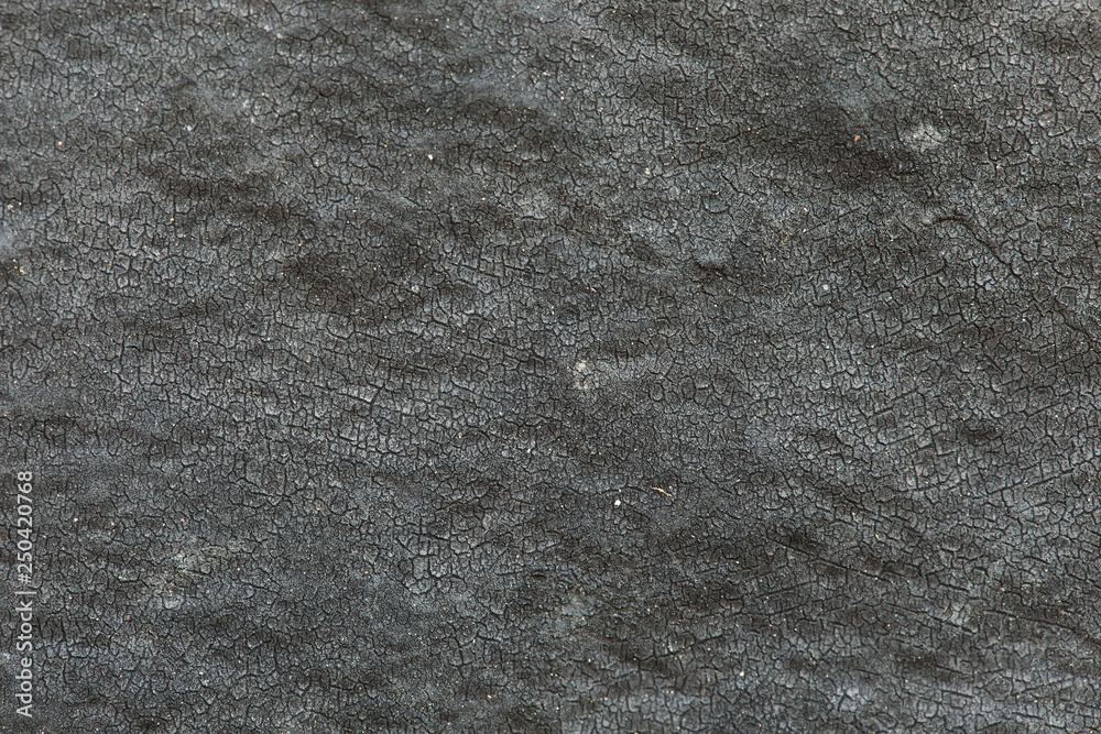 artificial backgrounds, texture of the surface of old black rubber ...