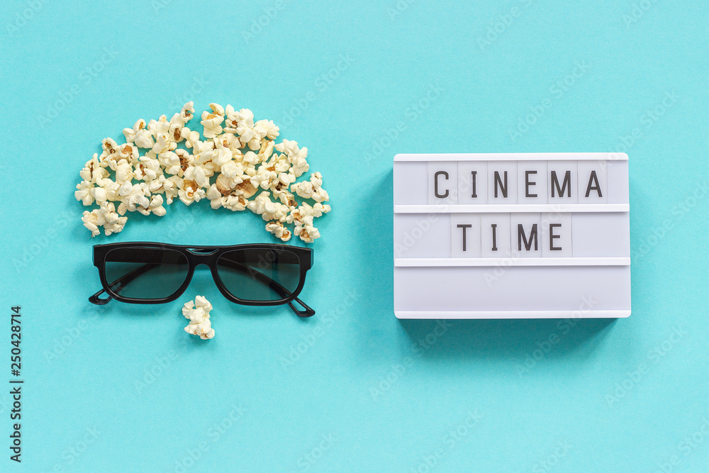Abstract image of viewer, 3D glasses, popcorn and light box text Cinema ...