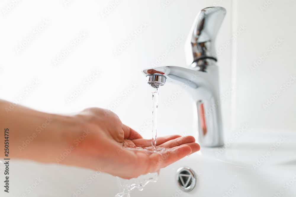 Hand Under Running Water Tap