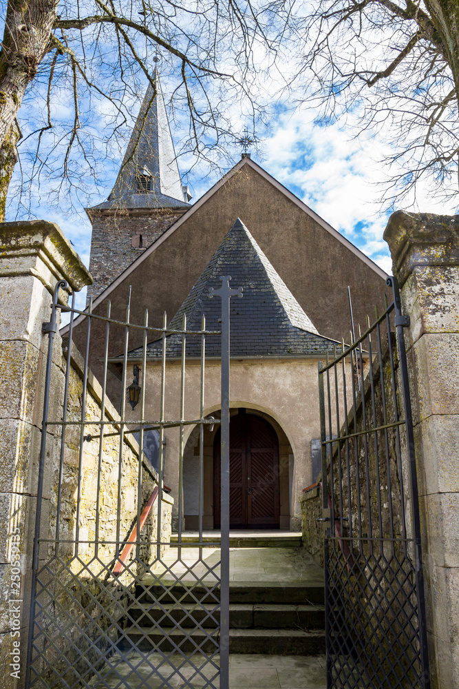 Munshausen church entrance, at Munshausen, Canton of Clervaux ...
