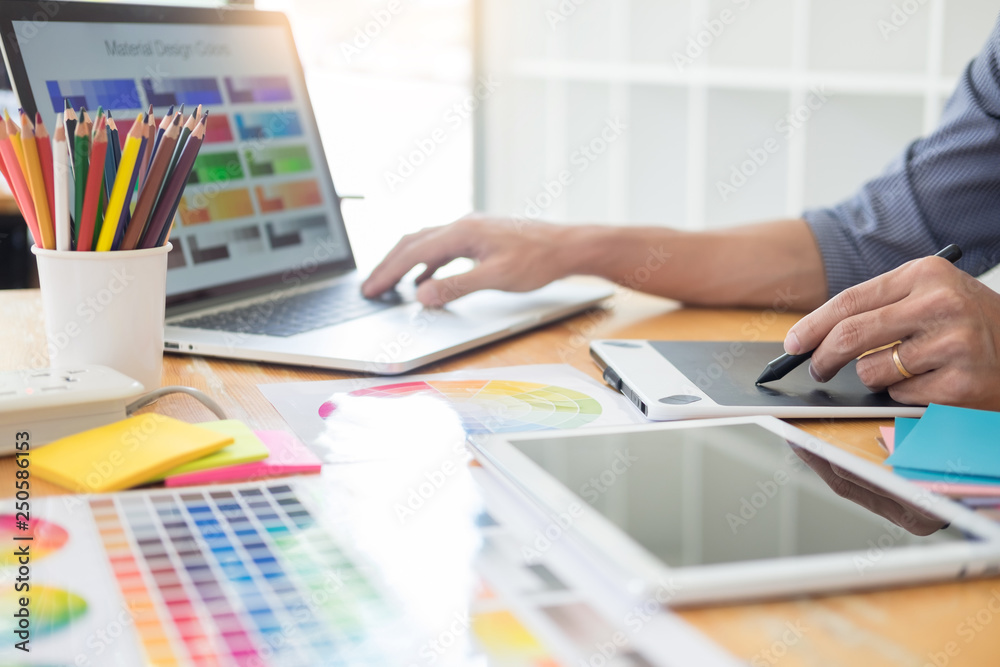 team interior designer drawing a new project using graphic computer and ...