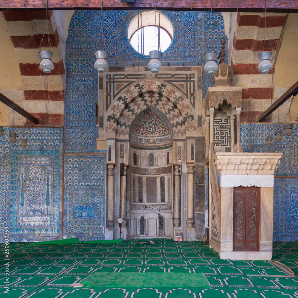 Blue ceramic tiles, Engraved Mihrab (niche) and decorated marble Minbar ...