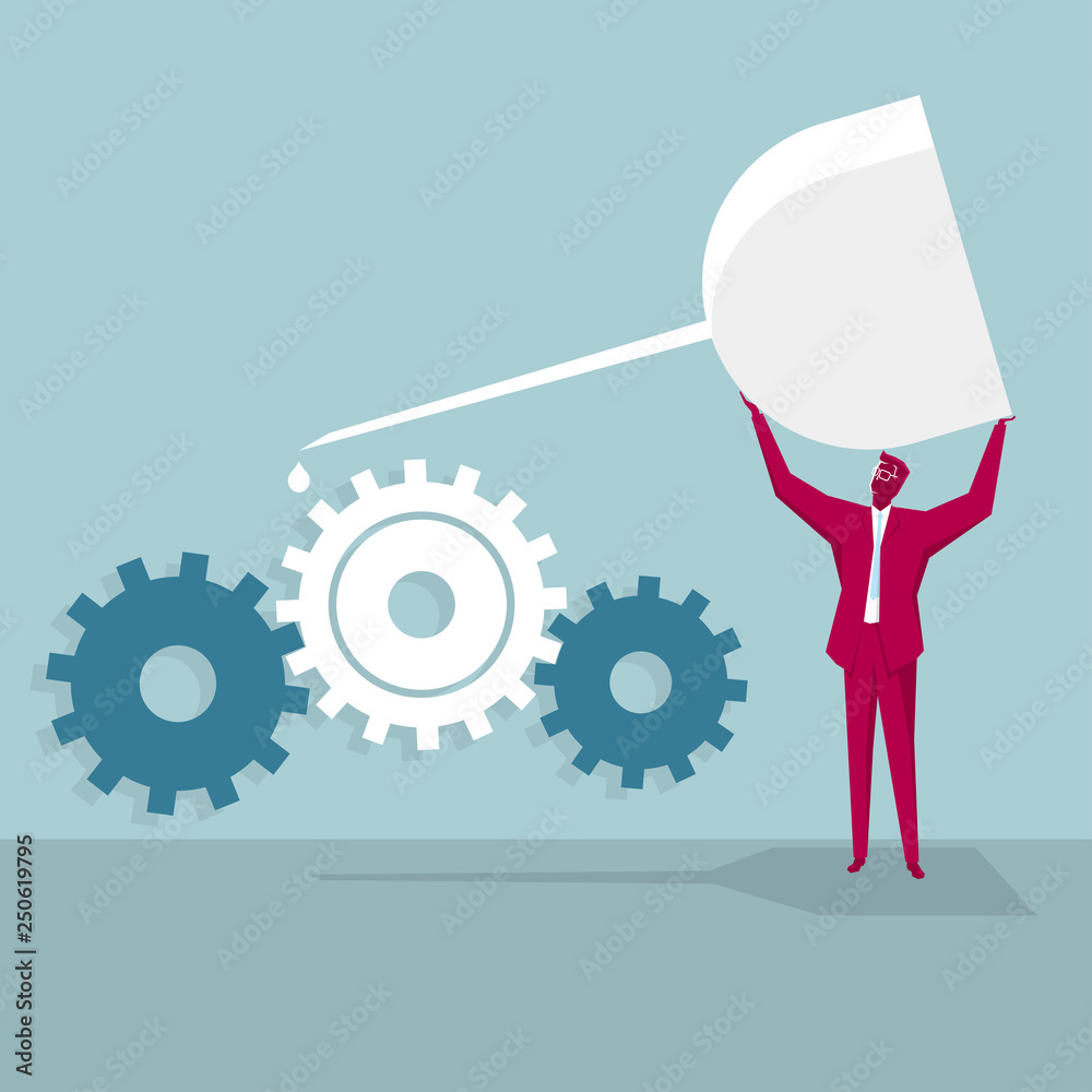 Mechanical maintenance. A businessman is injecting lubricant into the ...