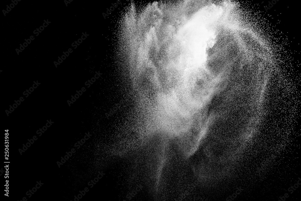 Bizarre forms of white powder explosion cloud against black background ...