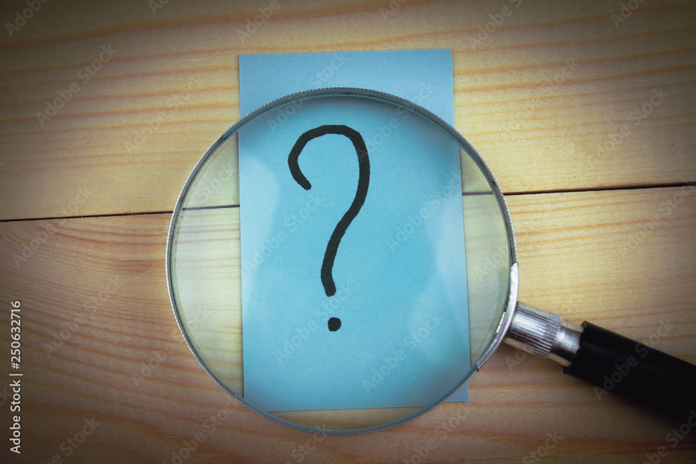 magnifying glass and question mark Stock Photo | Adobe Stock