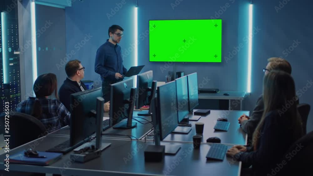 Team of Professional IT Developers Have a Meeting, Speaker Talks about ...