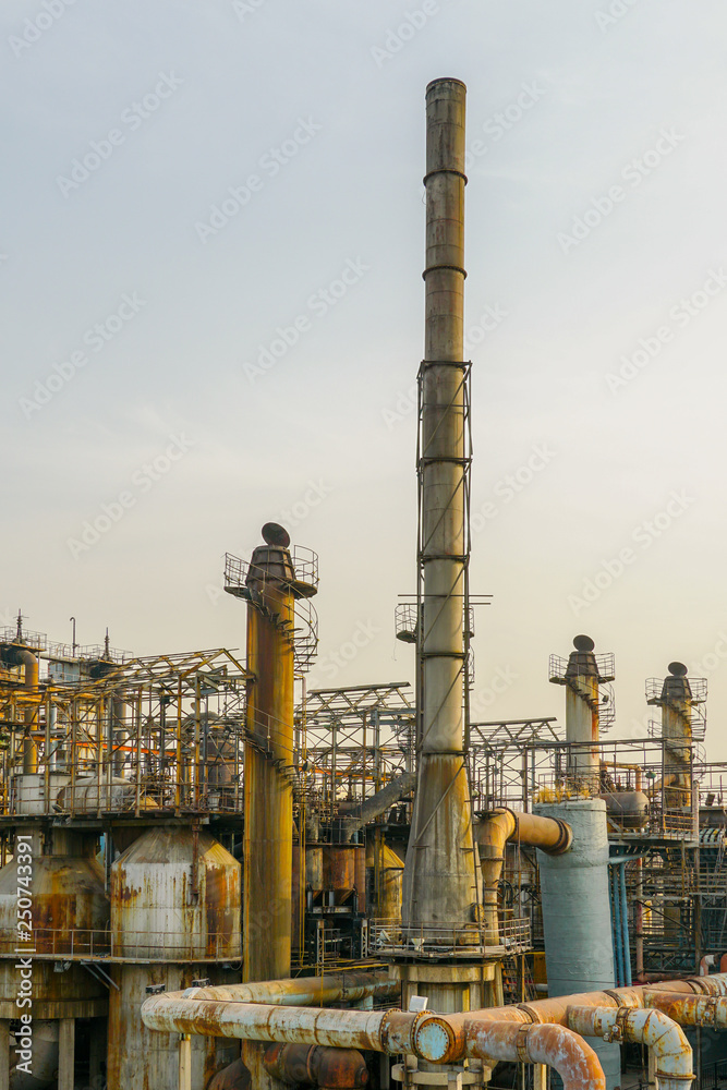 Old Factory metal structures. Industrial plant with old, rusty pipes ...