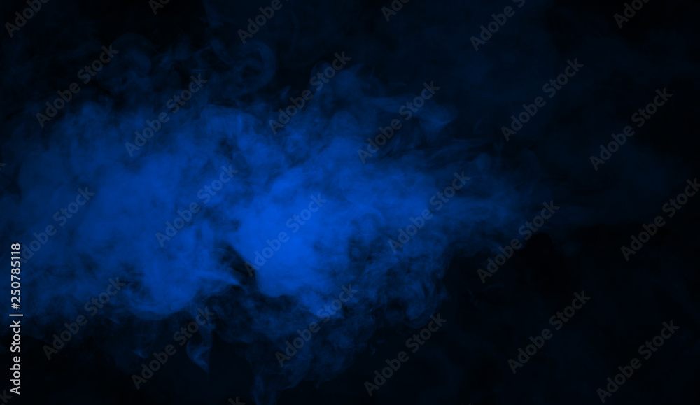 Abstract blue smoke mist fog on a black background. Texture background ...