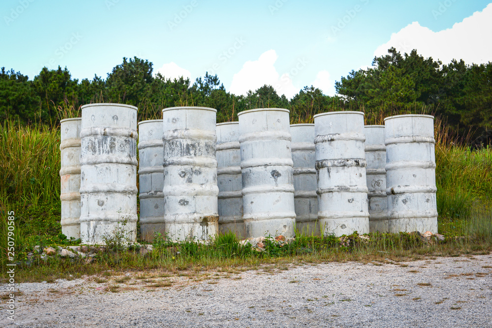 Storage water tank concrete cement on hill and meadow background Stock ...