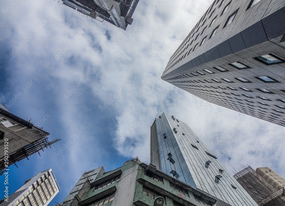 Looking up to the sky in Hong Kong. The tall buildings can not be ...