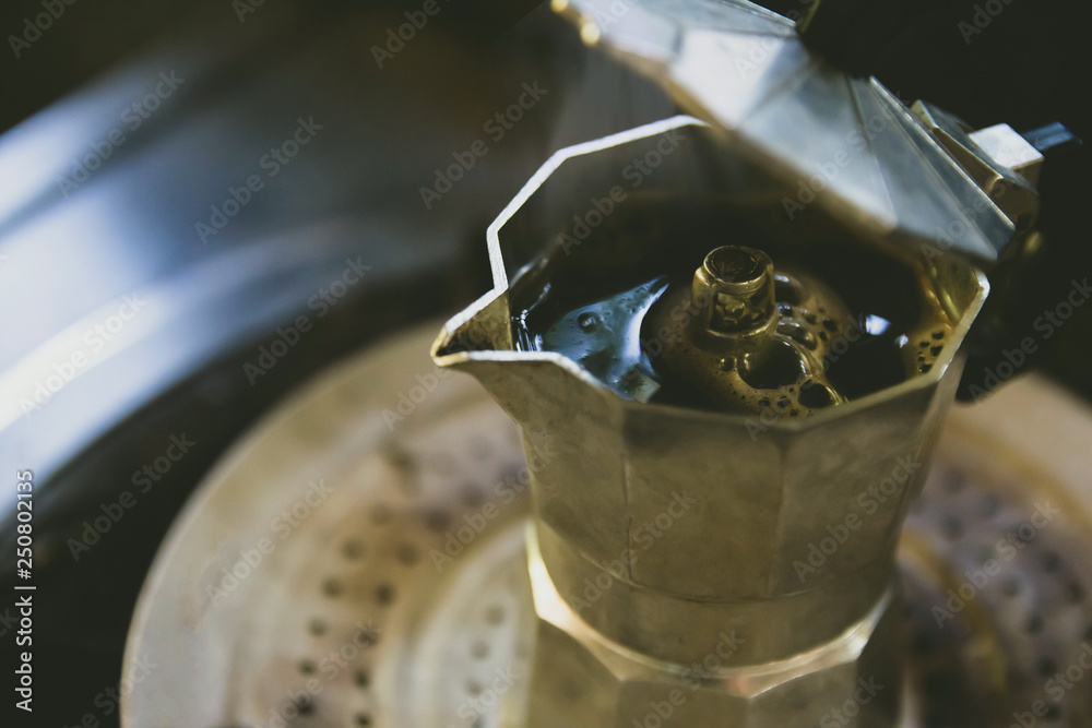 Moka Pot Espresso coffee pot using steam pressure through roasted ...