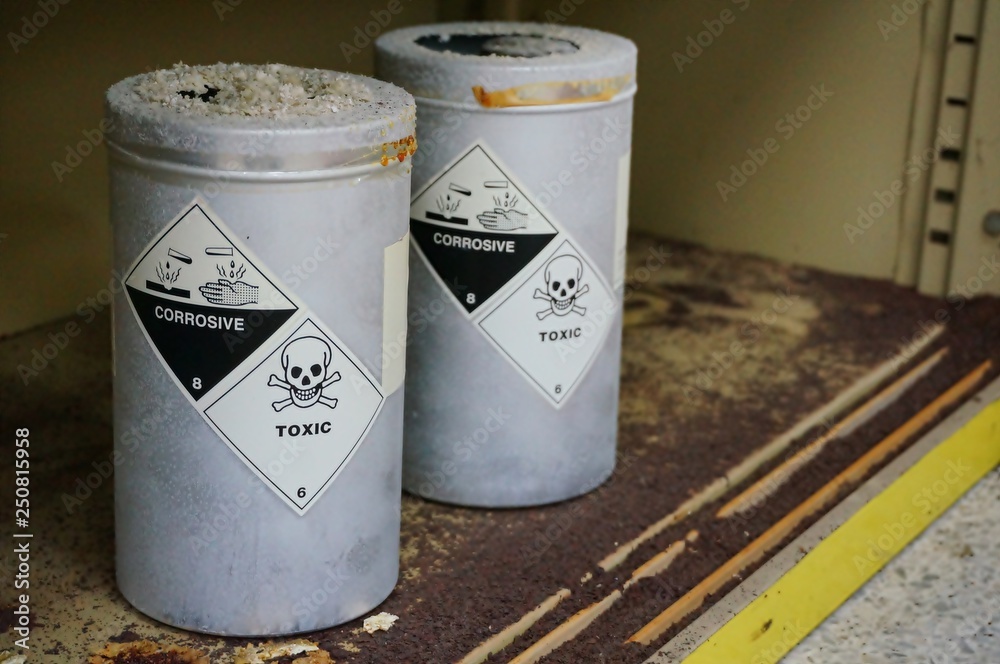 Metal container of hazardous dangerous chemical with very toxic warning ...