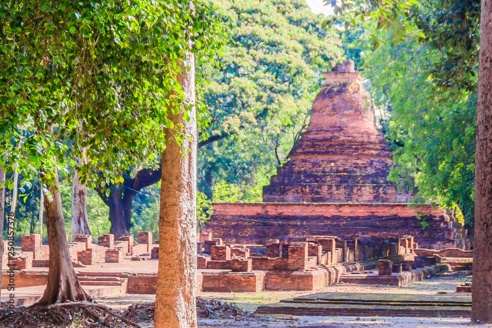 Lanka style ruins pagoda of Wat Mahathat temple in Muang Kao Historical Park, the ancient city ...