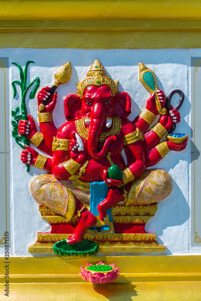 Colorful Ganesha Hindu god avatar images in stucco low relief white ...