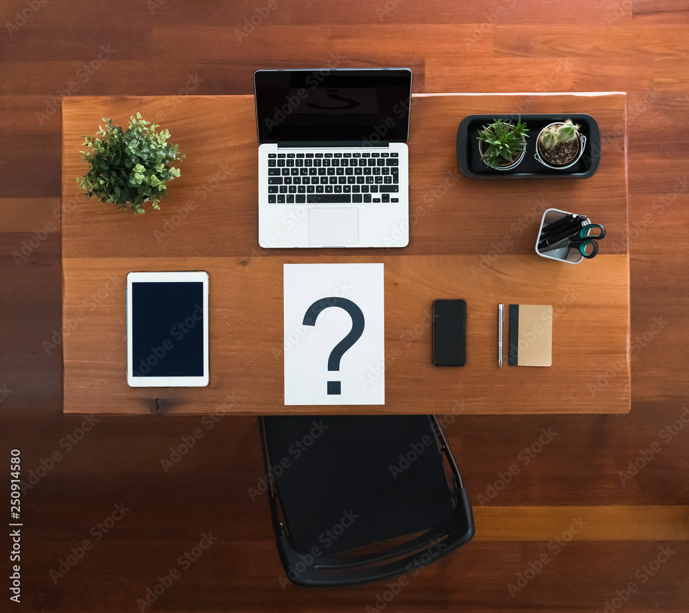 Question mark on the desk at office Stock Photo | Adobe Stock