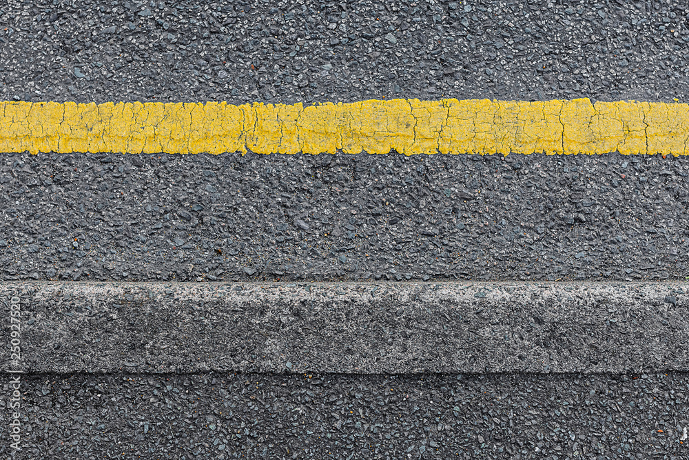 Seamless roadside curb with a single yellow line from above. Stock ...