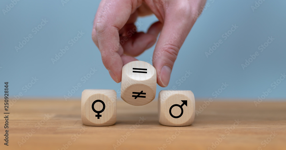Symbol for gender equality. Hand turns a dice and changes a unequal ...