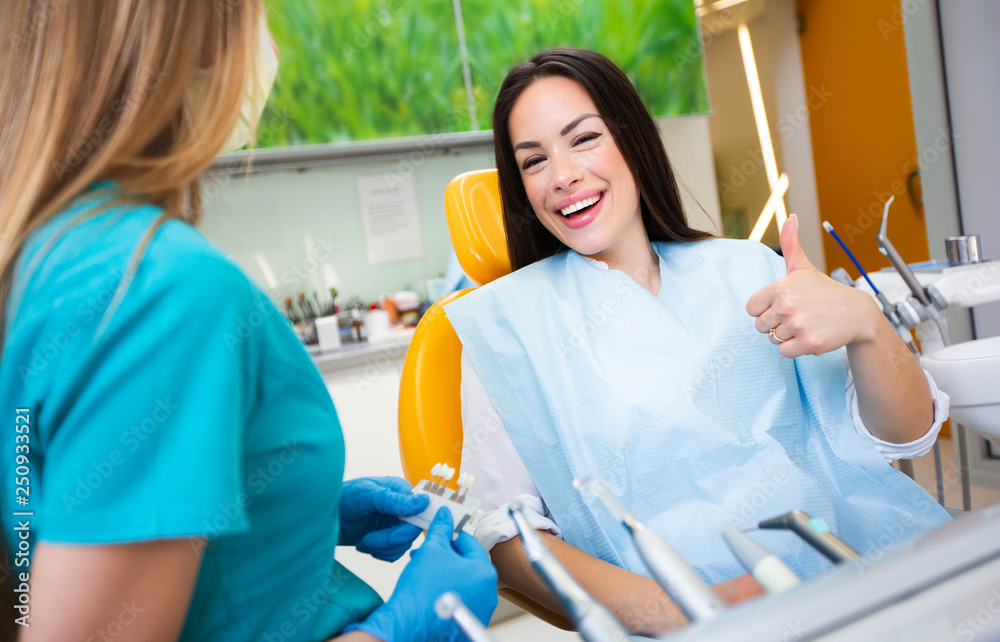 Dental patient thumbs up Stock Photo | Adobe Stock