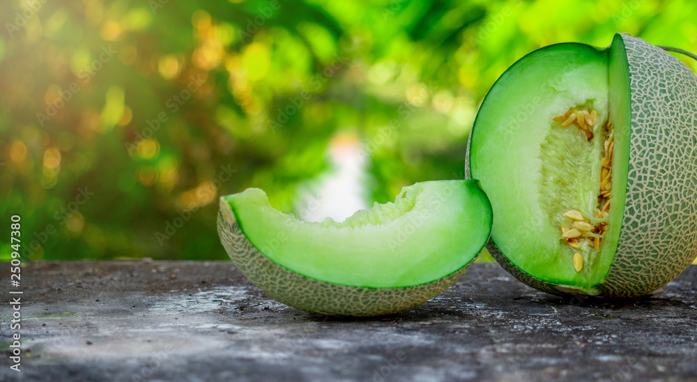 Melon on the stone table. Melon Is a plant in the family Cucurbitaceae ...