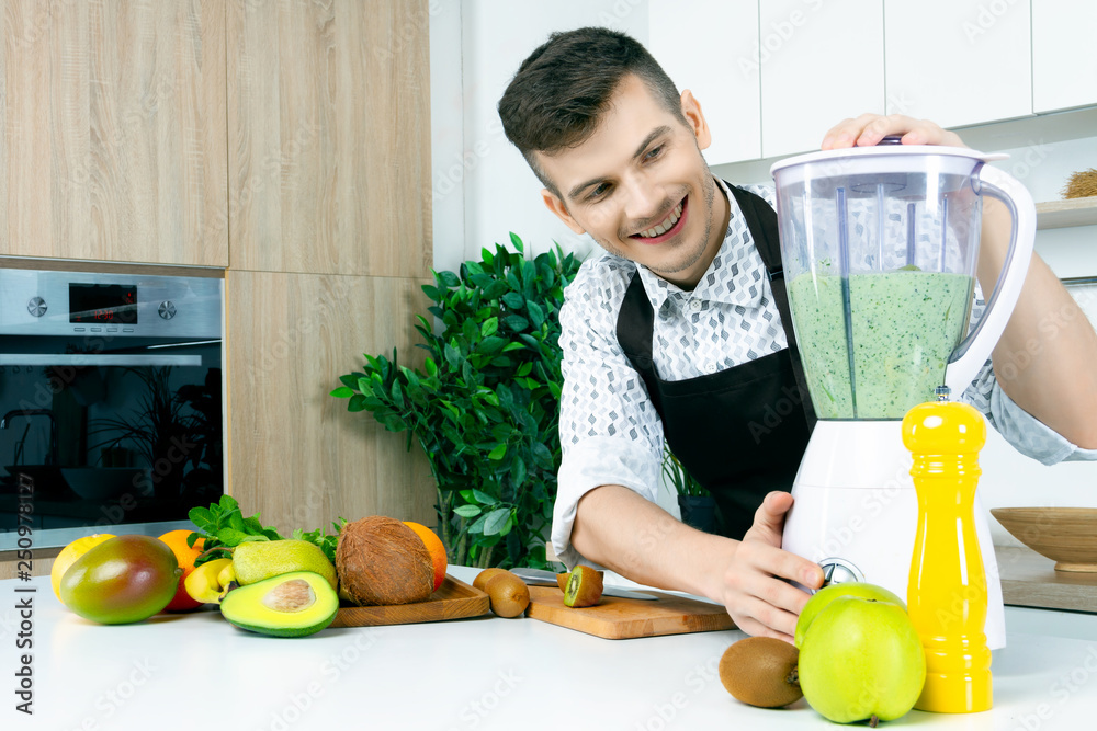 Young man male barista chef with apron doing cook fresh vitamin summer ...