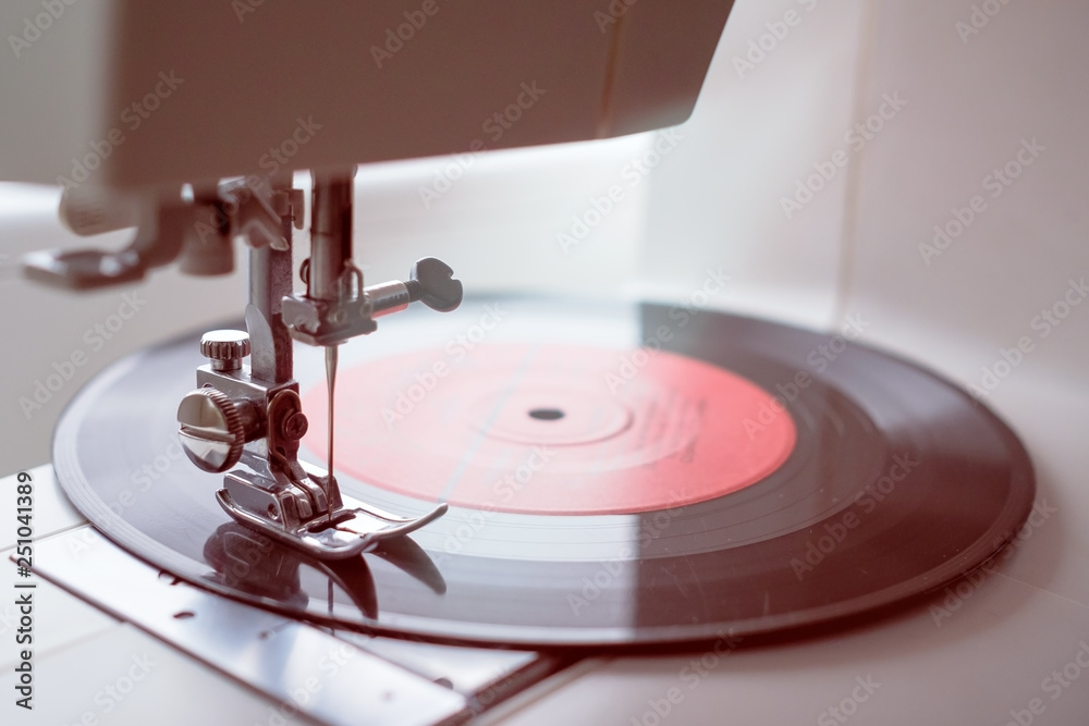 Vinyl on sewing machine. How to use old stuff concept. Stock Photo ...