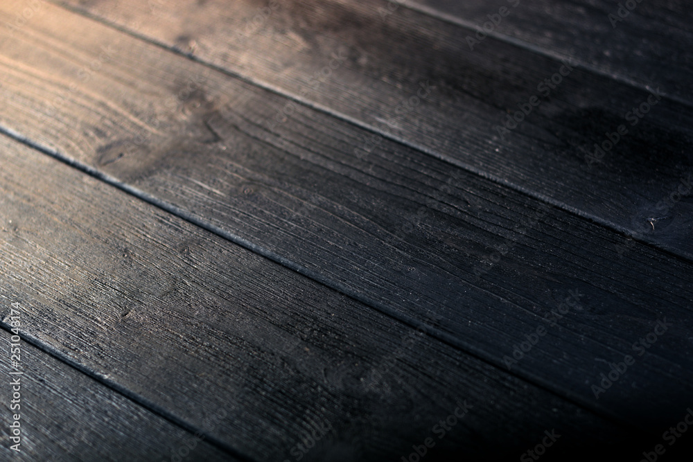 Black wood texture, angle wise. Dark background with natural soft light ...