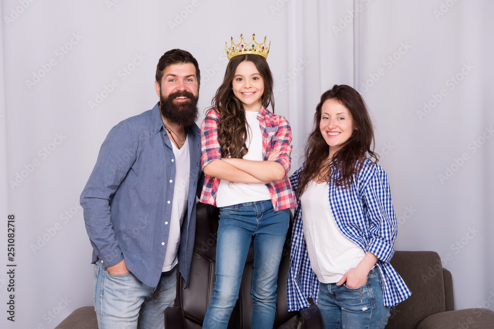 Beautiful princess. Little girl love her parents at home. Bearded man ...