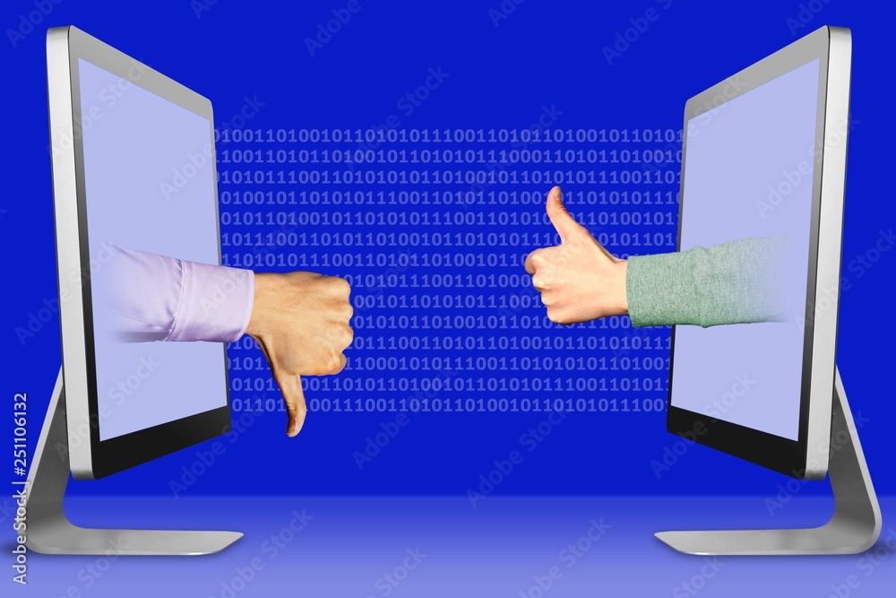 online concept, two hands from monitors. thumbs down, dislike and ...
