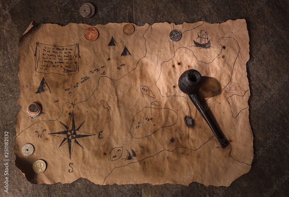 ancient map pf tresures on pirate table, old captain pipe and many ...