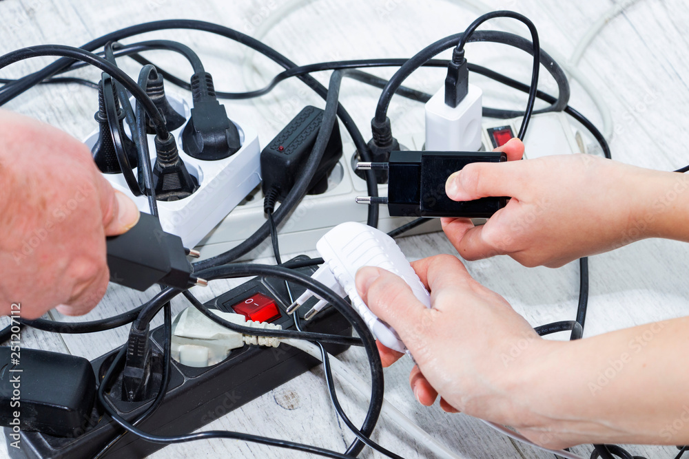 Lots of electrical outlets-enabled devices. Power saving Stock Photo ...