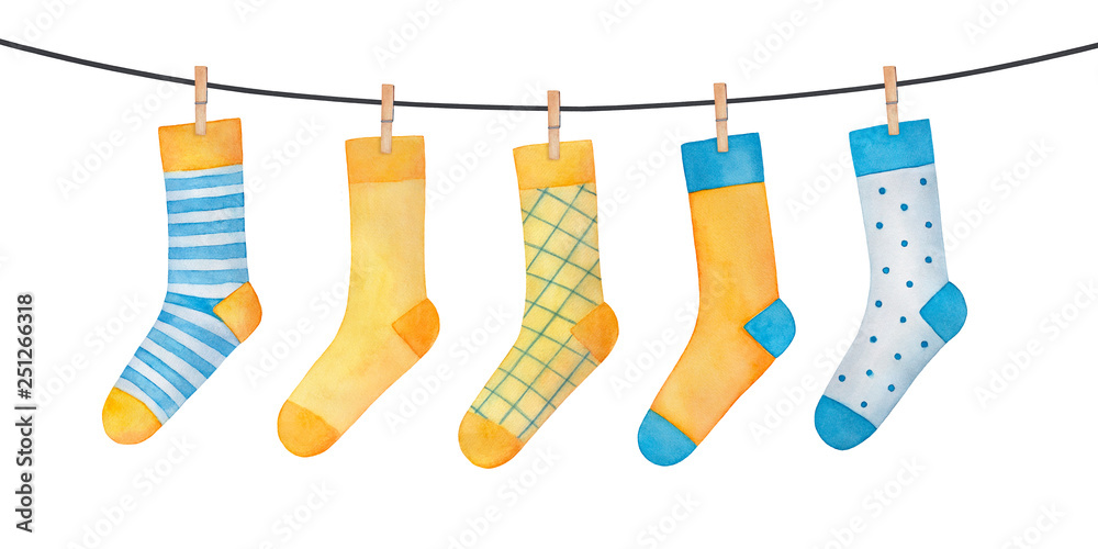 Various colorful socks on clothesline. Striped, checkered, polkadot ...