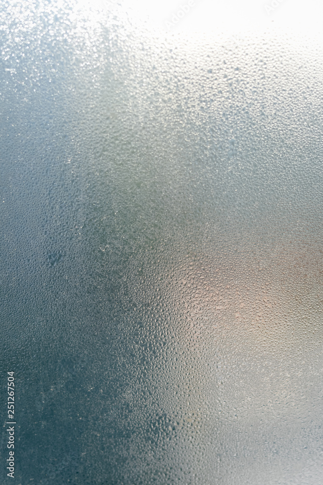 Close up on condensated water foggy window glass natural textured ...
