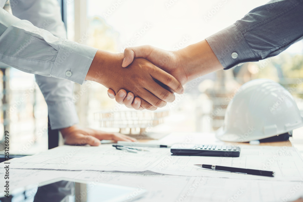Engineer meeting for architectural project and working with partner ...