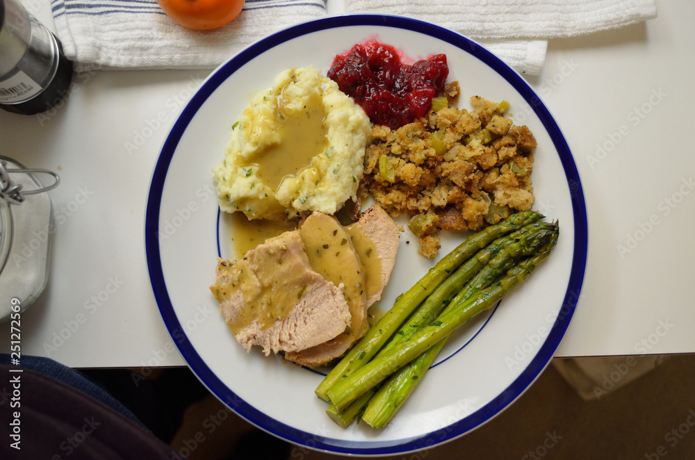 Thanksgiving turkey dinner with gravy stuffing, mashed potatoes ...