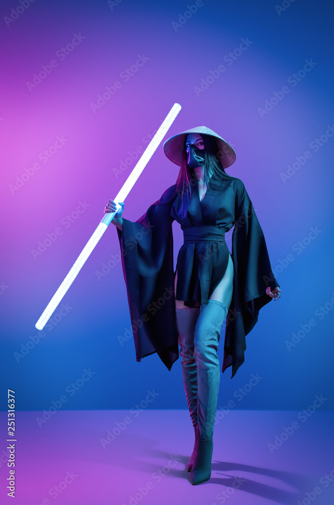 Concept on cosmic cosplay. Сontemporary portrait a young athletic woman ...