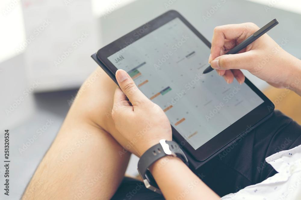 Man planning agenda and schedule using calendar event planner. Man ...