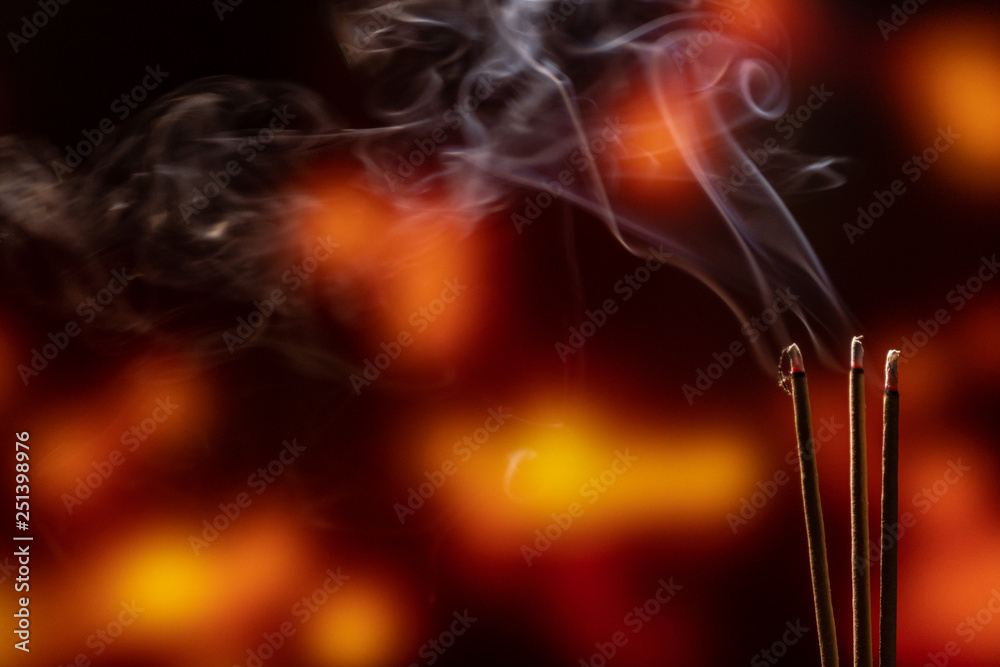 Burning Incense Sticks with smoke, joss sticks burning at a vintage ...