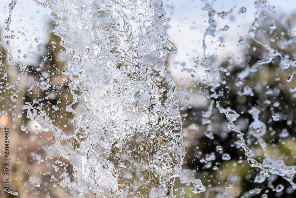 water splash on blurred background Stock Photo | Adobe Stock