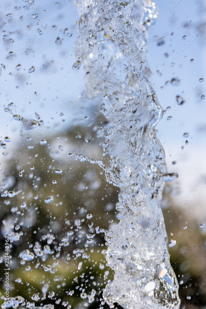 water splash on blurred background Stock Photo | Adobe Stock