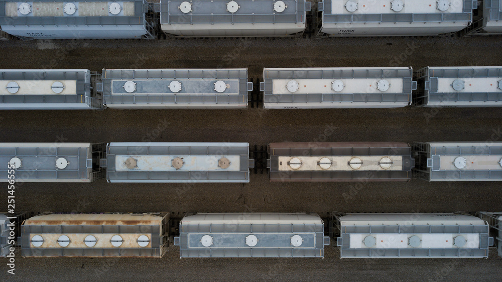 Aerial view of freight trains. Rail cars with goods on railroad. Top ...
